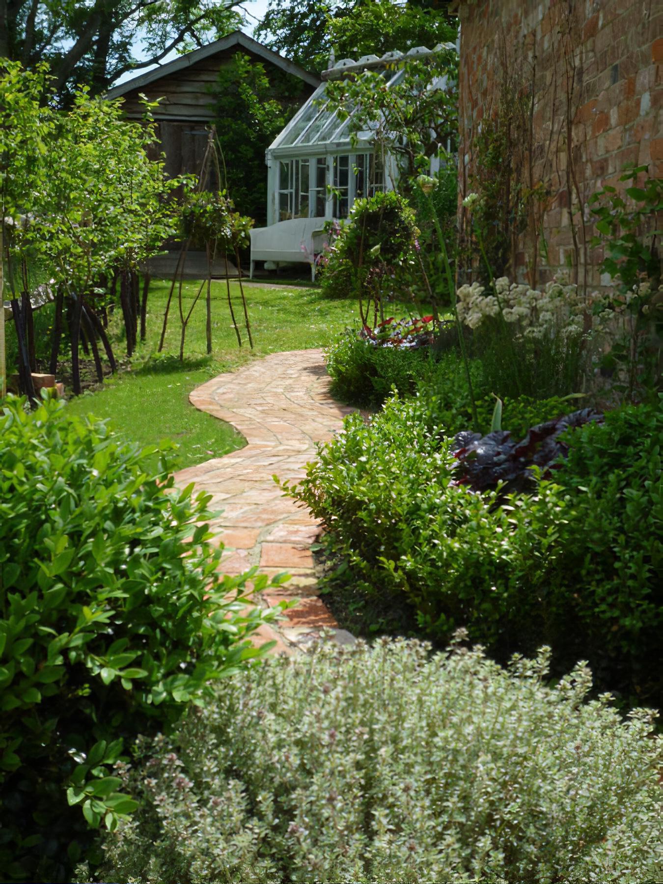 A new cottage path garden by london garden designer claudia de yong