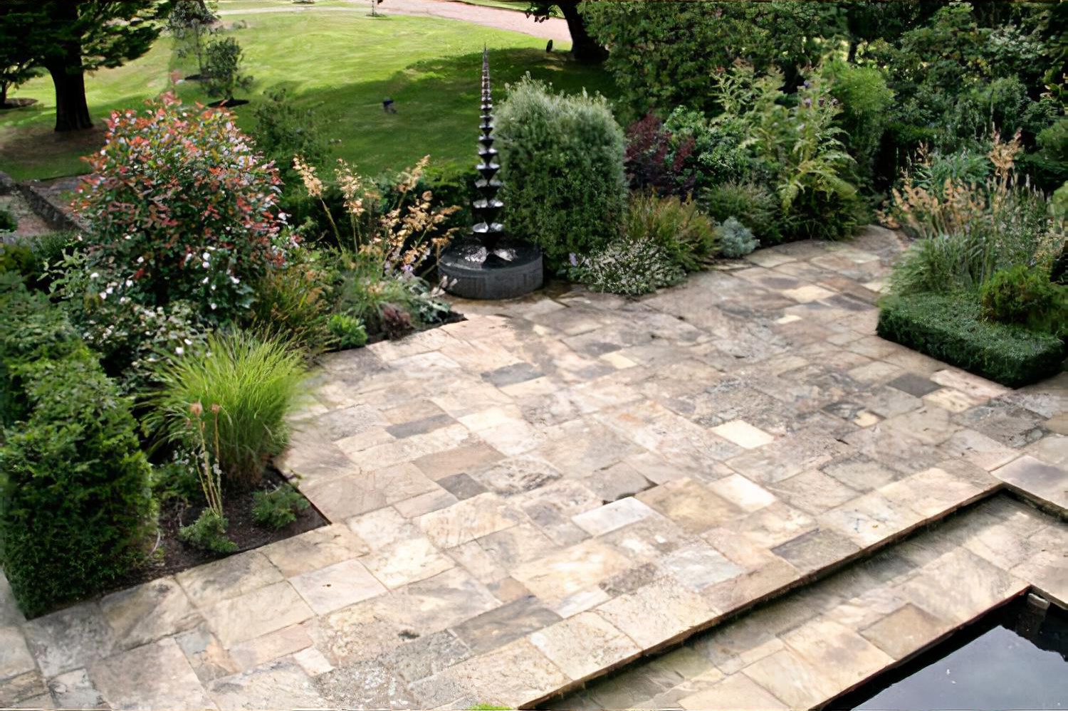 Water garden with reflective pool & rill by Hampshire garden designer ...